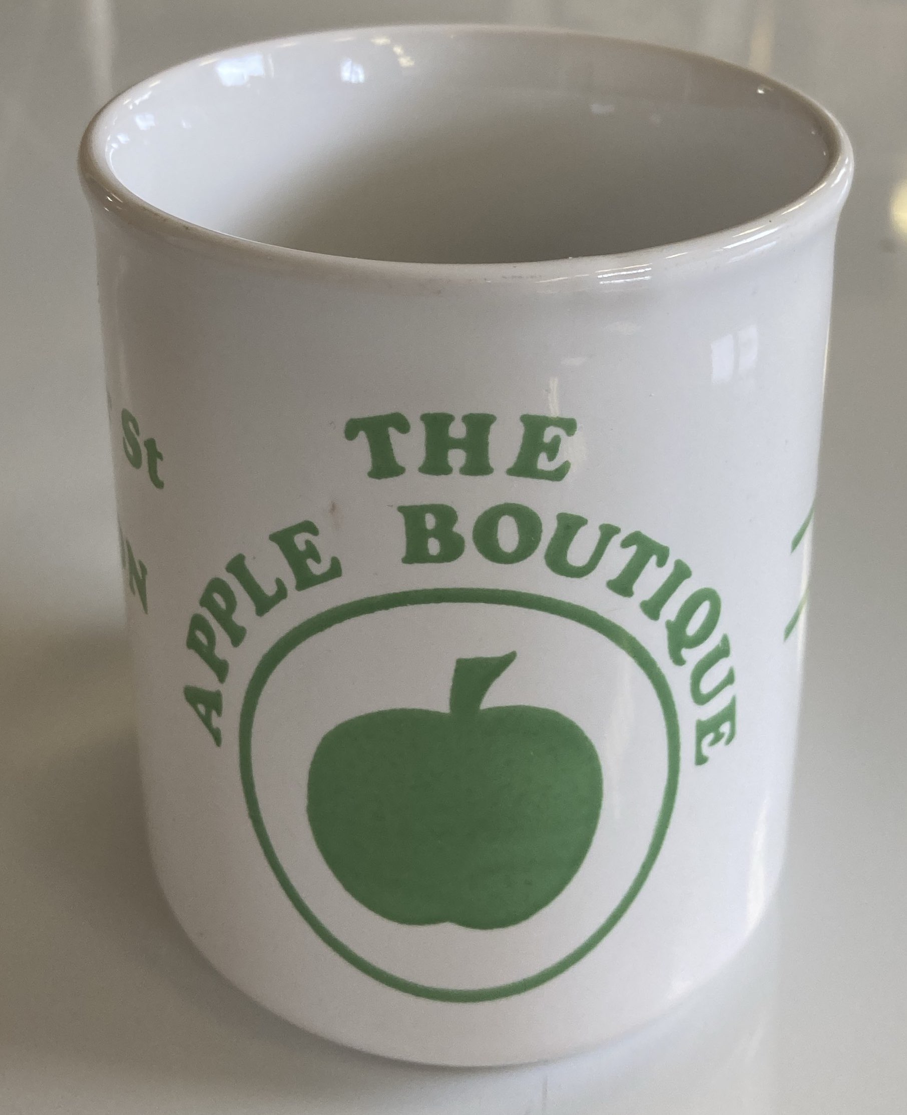 Lot 353 - ORIGINAL APPLE BOUTIQUE MUG.