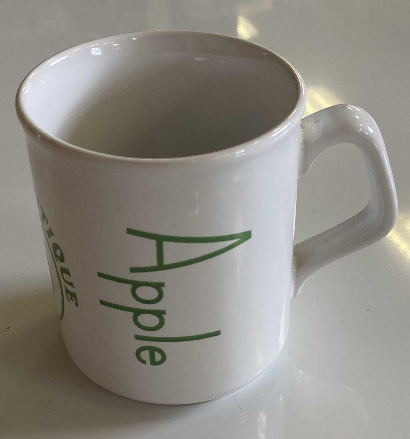 Lot 353 - ORIGINAL APPLE BOUTIQUE MUG.