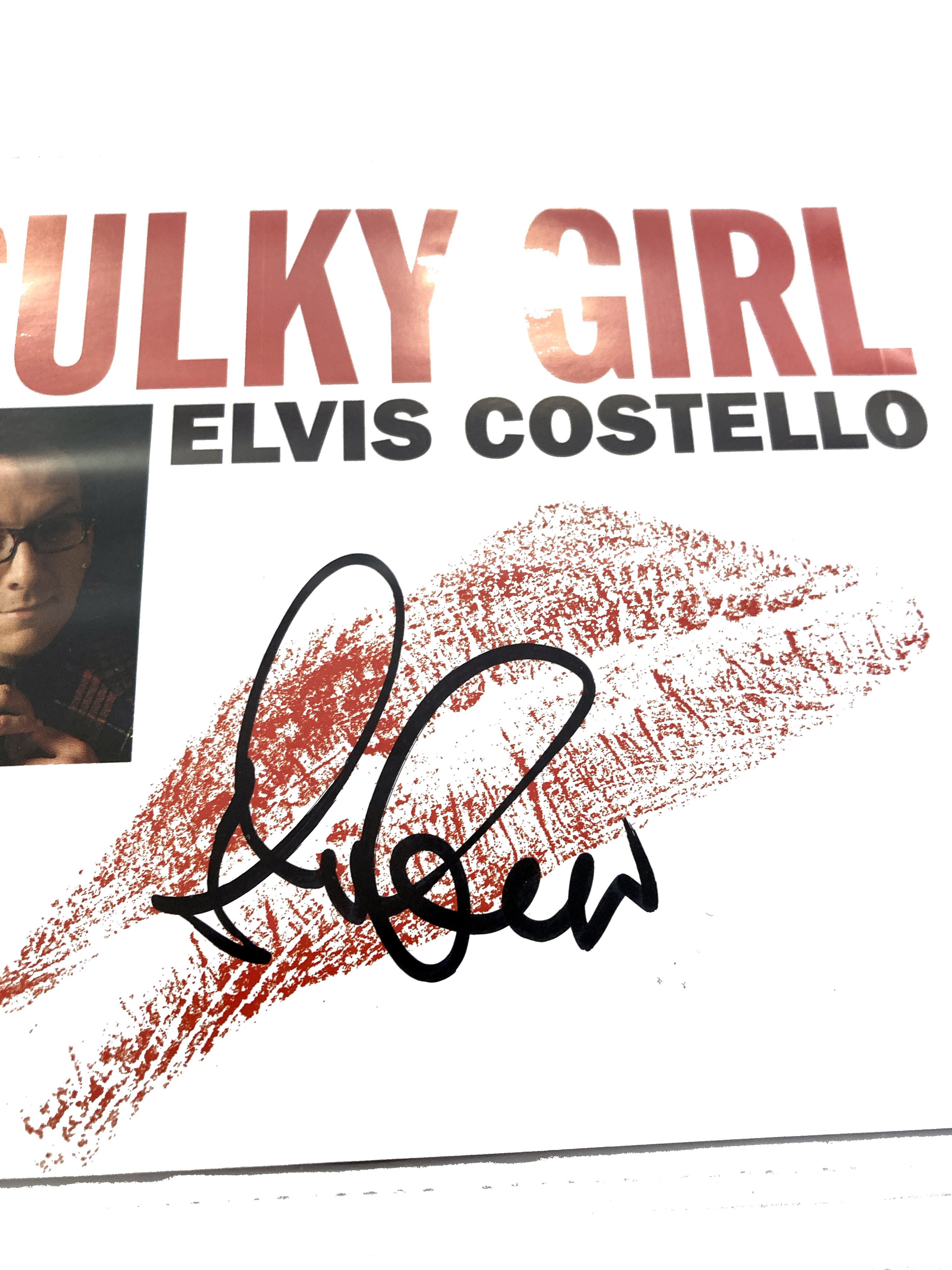 Lot 221 - ELVIS COSTELLO SIGNED ITEMS.