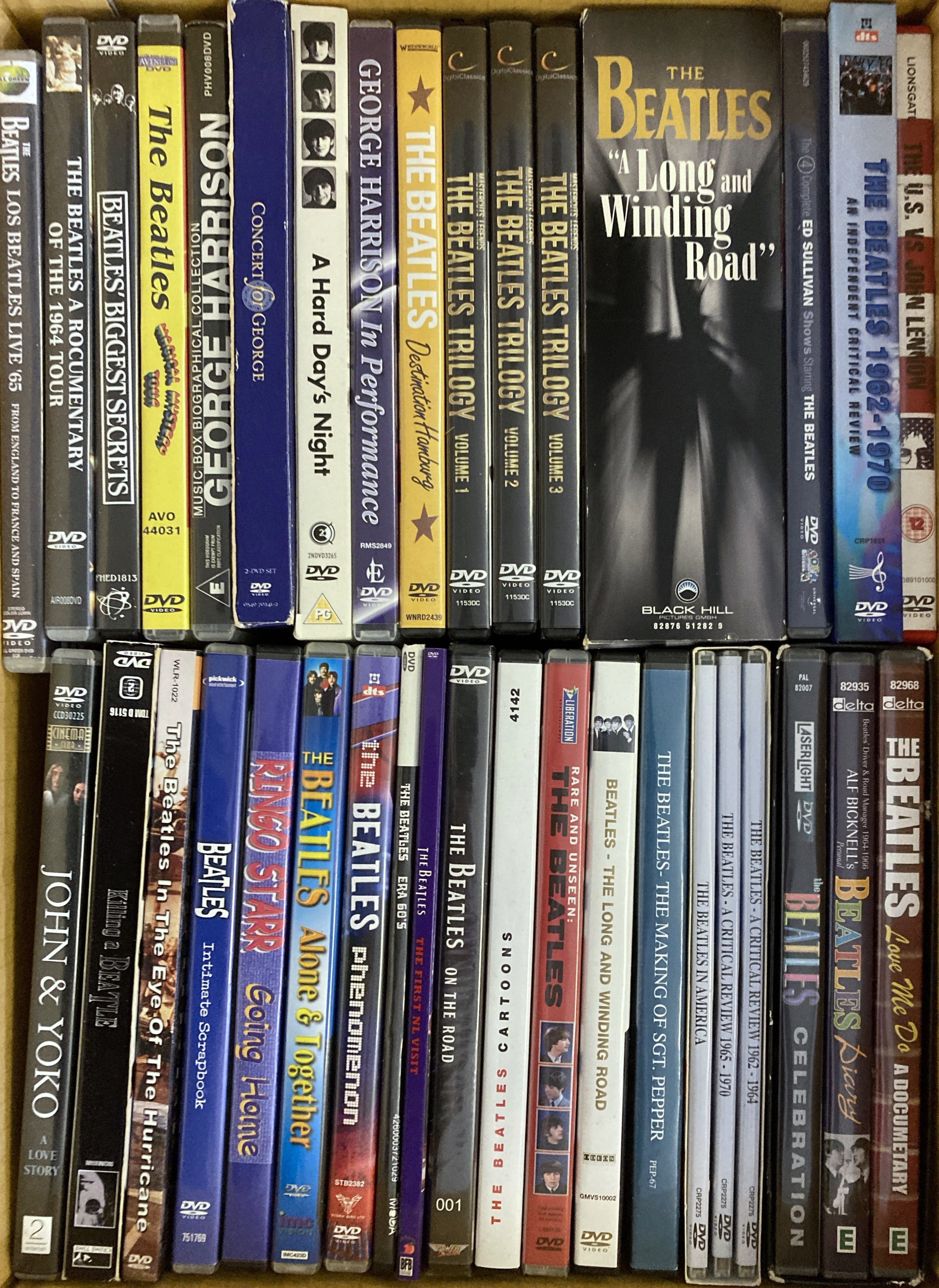 Lot 195 - BEATLES VHS AND DVDS.