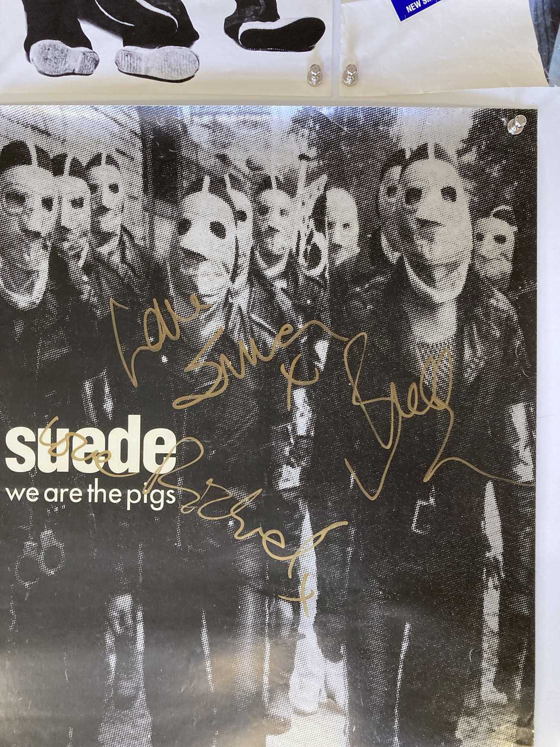 Lot 215 - SUEDE POSTERS INC TWO SIGNED.