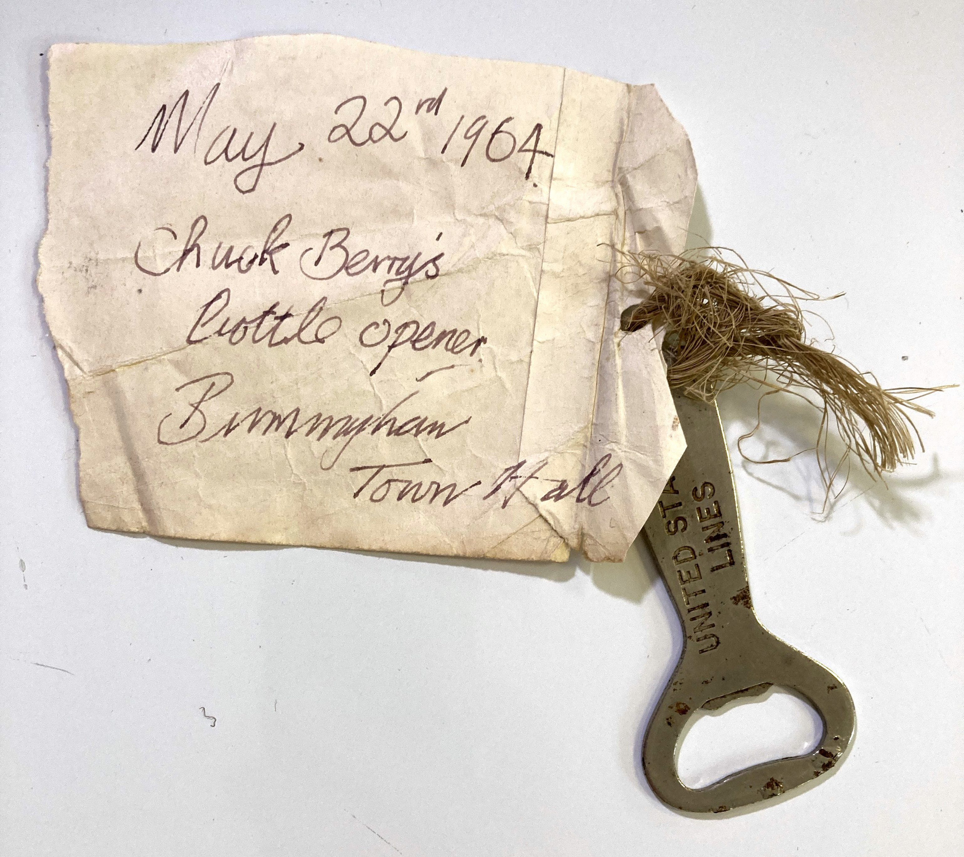 Lot 87 - CHUCK BERRY BOTTLE OPENER AND TICKET STUB.