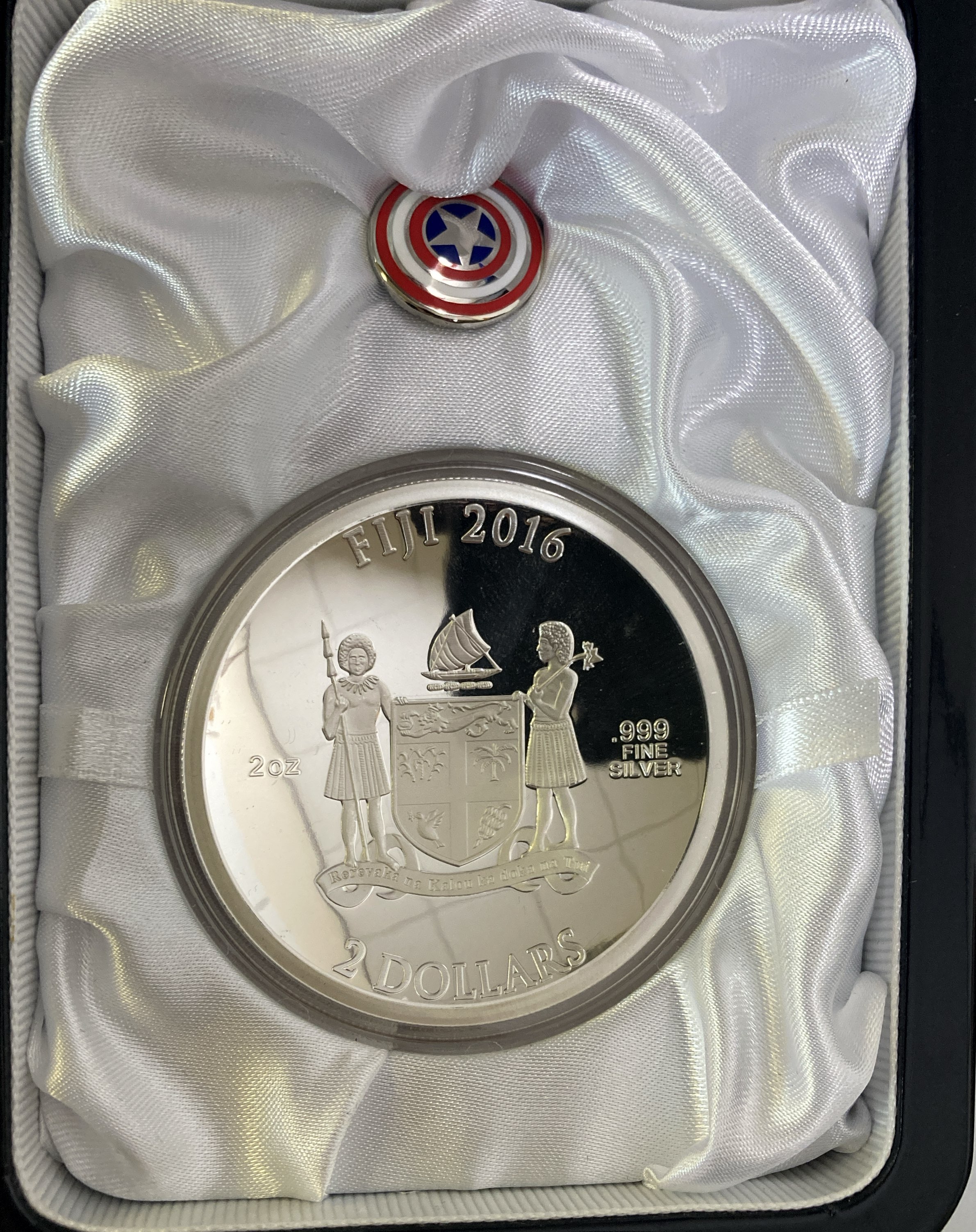 Lot 6 - CAPTAIN AMERICA 2OZ SILVER COIN.