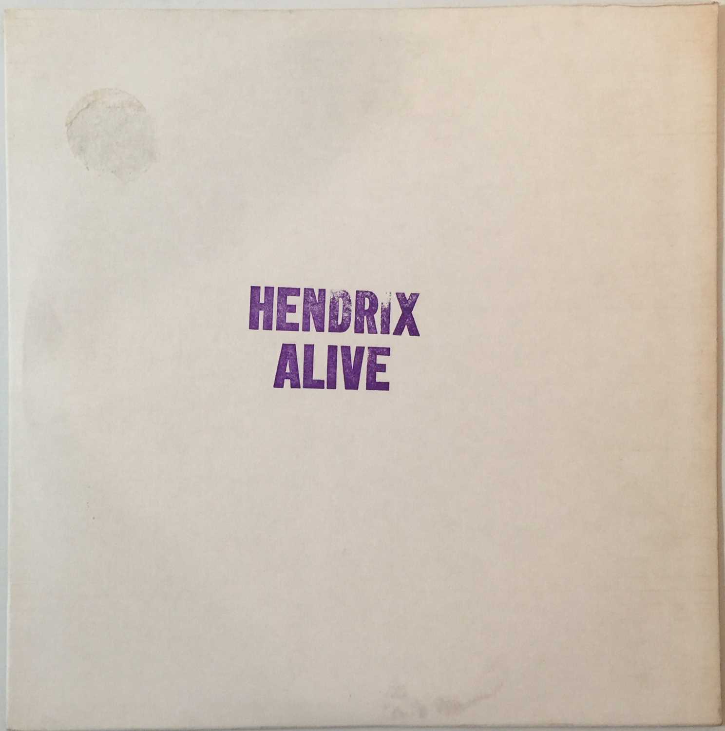 Lot 974 - JIMI HENDRIX - HENDRIX ALIVE LP (TMOQ RED