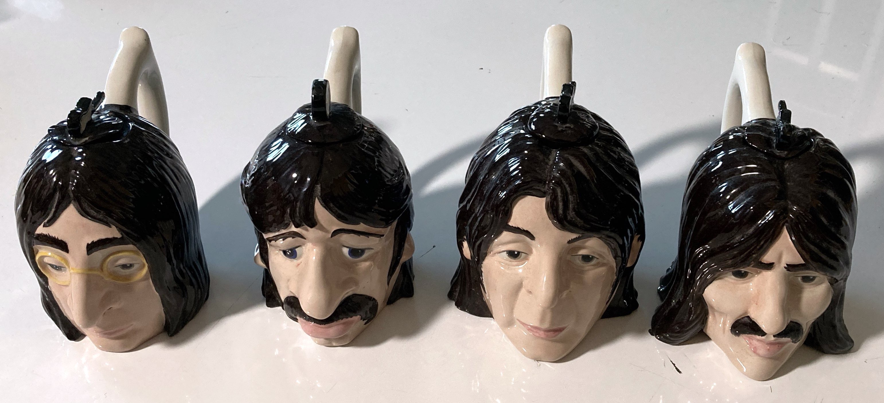 Lot 153 - THE BEATLES - A SET OF LORNA BAILEY TEAPOTS.