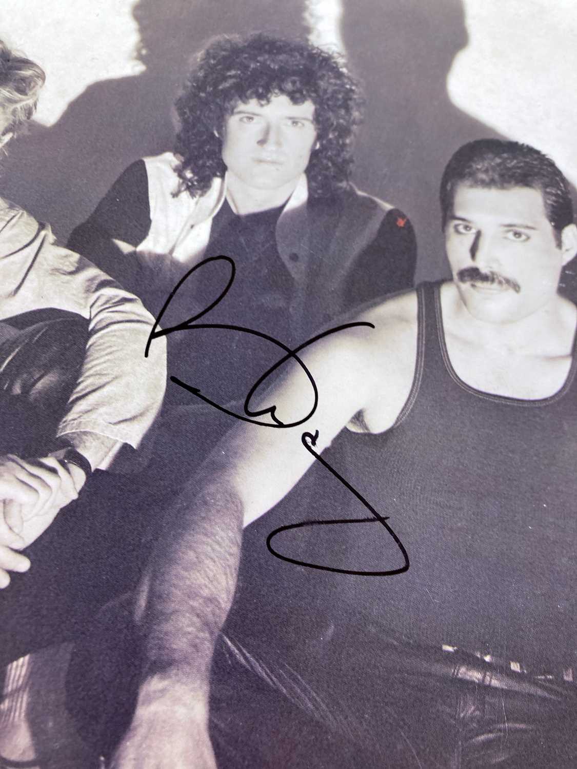 Lot 268 - QUEEN - BRIAN MAY SIGNED RECORDS.