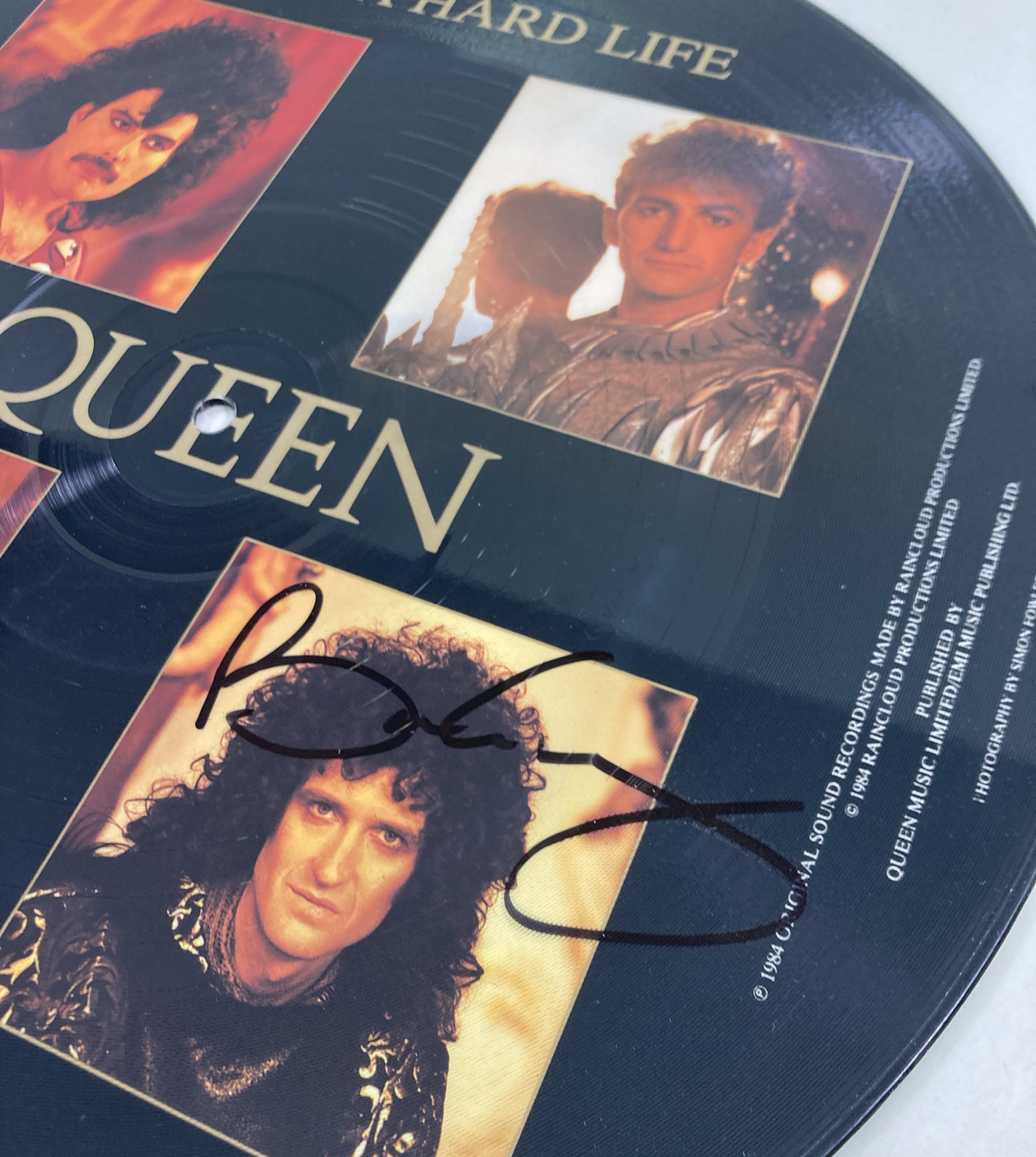 Lot 268 - QUEEN - BRIAN MAY SIGNED RECORDS.