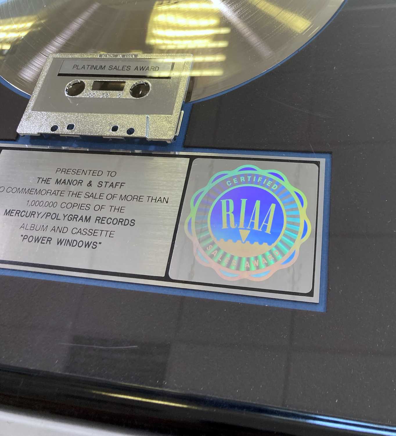 Lot 311 - RUSH - A PLATINUM RIAA AWARD.