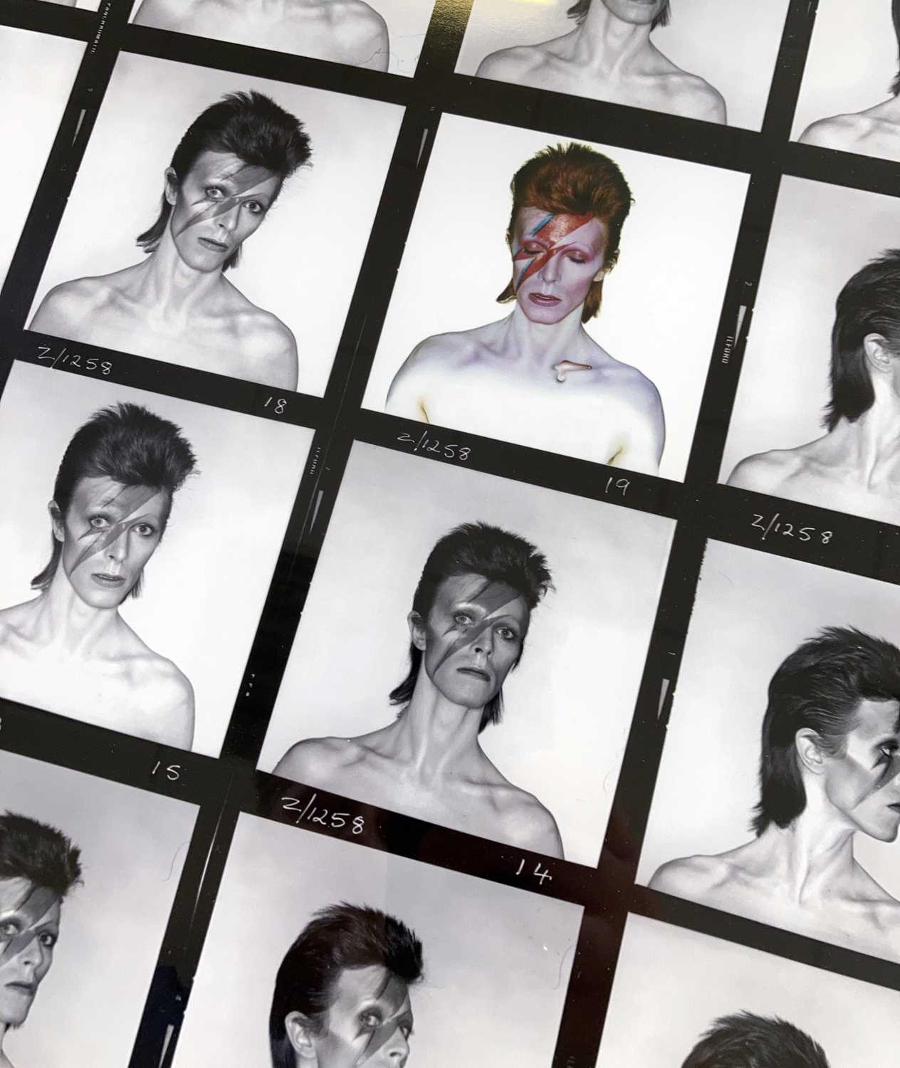 Lot 135 - DAVID BOWIE - A CONTACT SHEET SIGNED BY