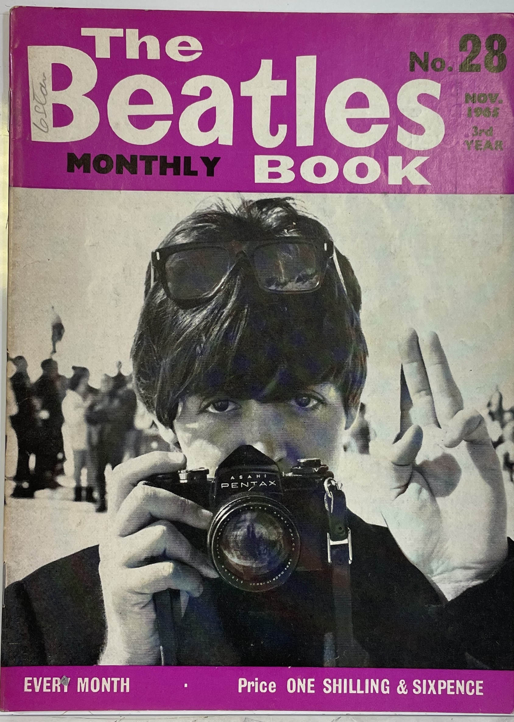 Lot 254 - GEORGE HARRISON - A SIGNED BEATLES MONTHLY