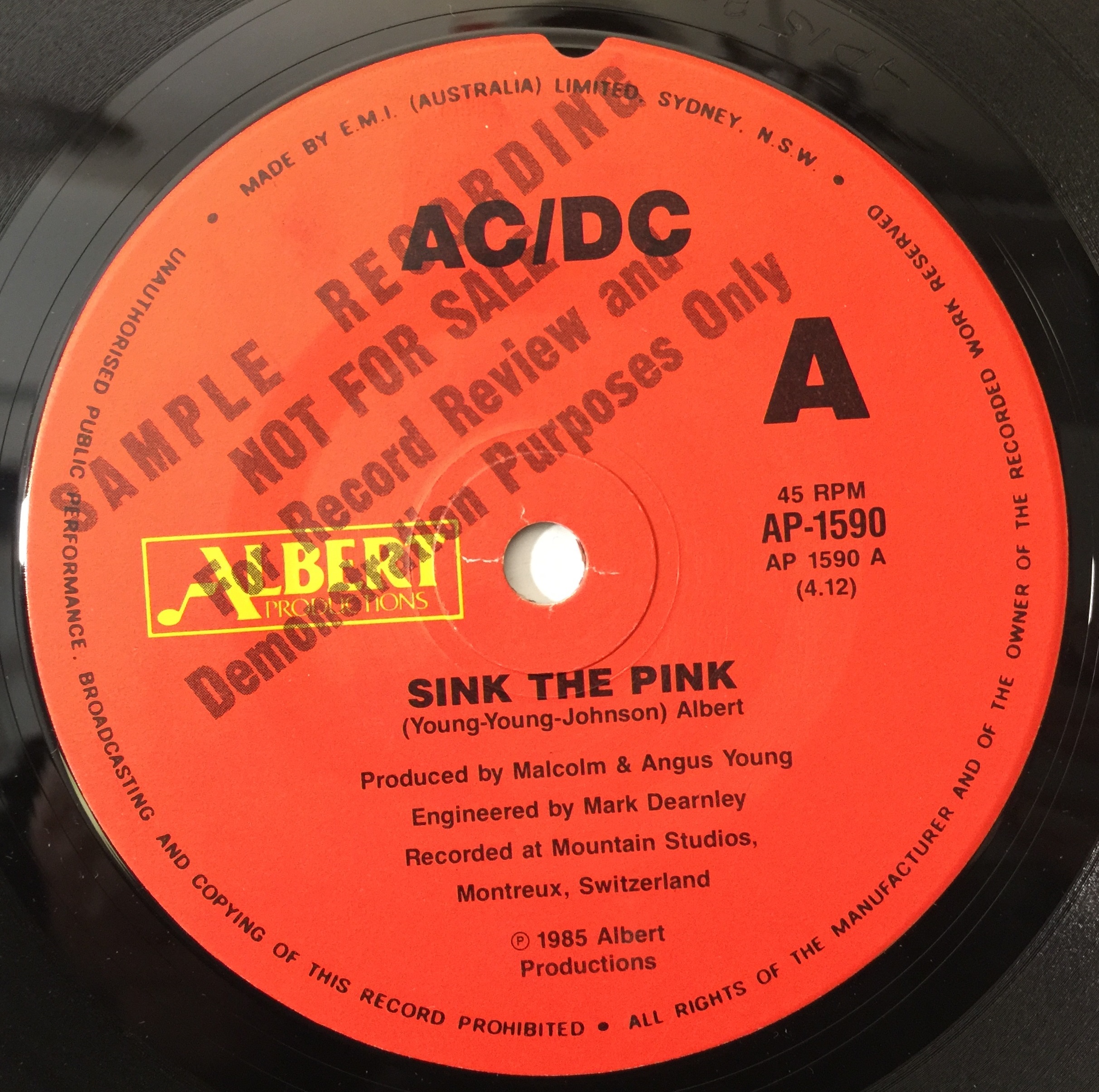Lot 310 - AC/DC - SINK THE PINK/ BACK IN BUSINESS 7"