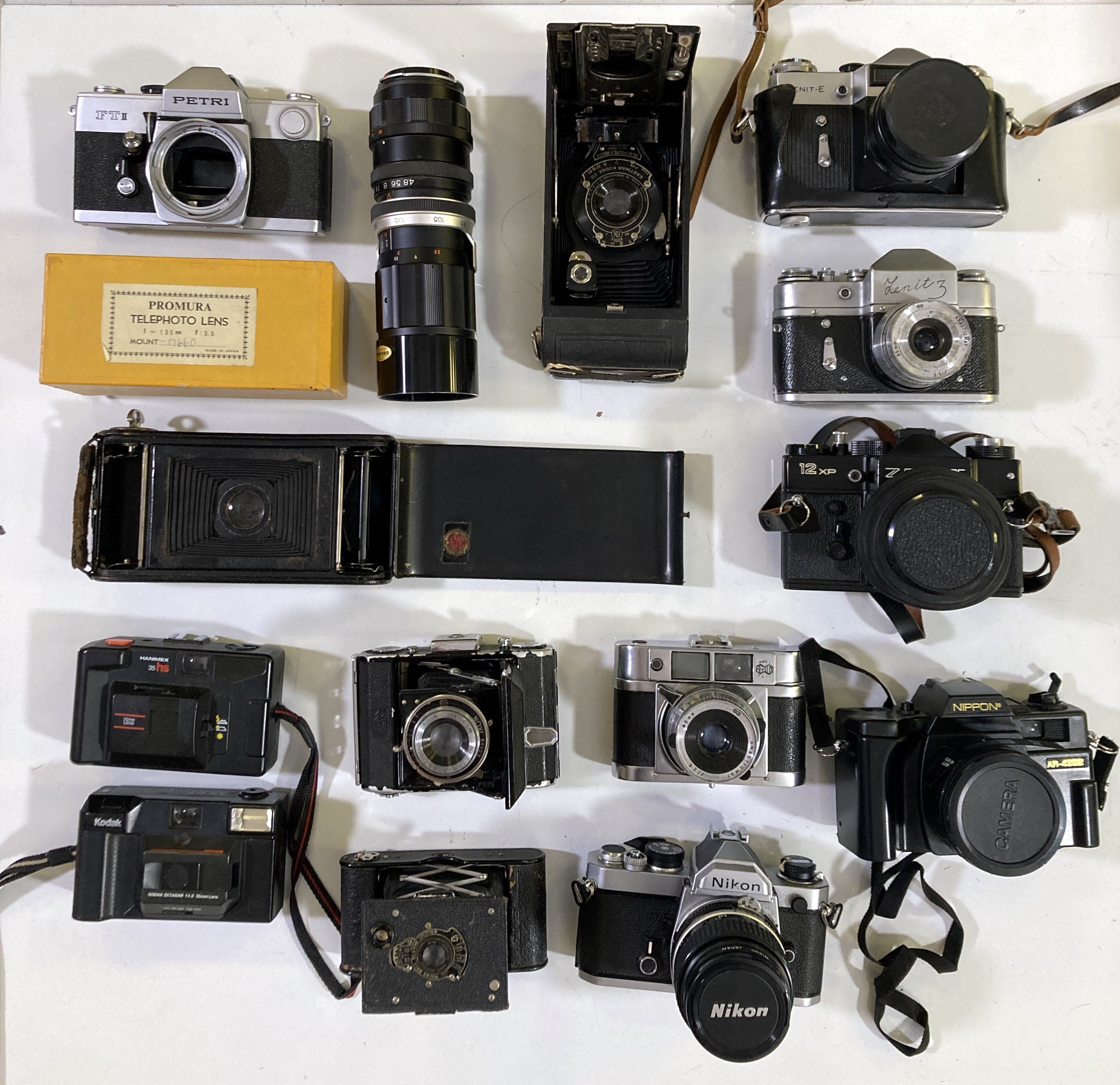Lot 2 - CAMERAS AND LENSES.