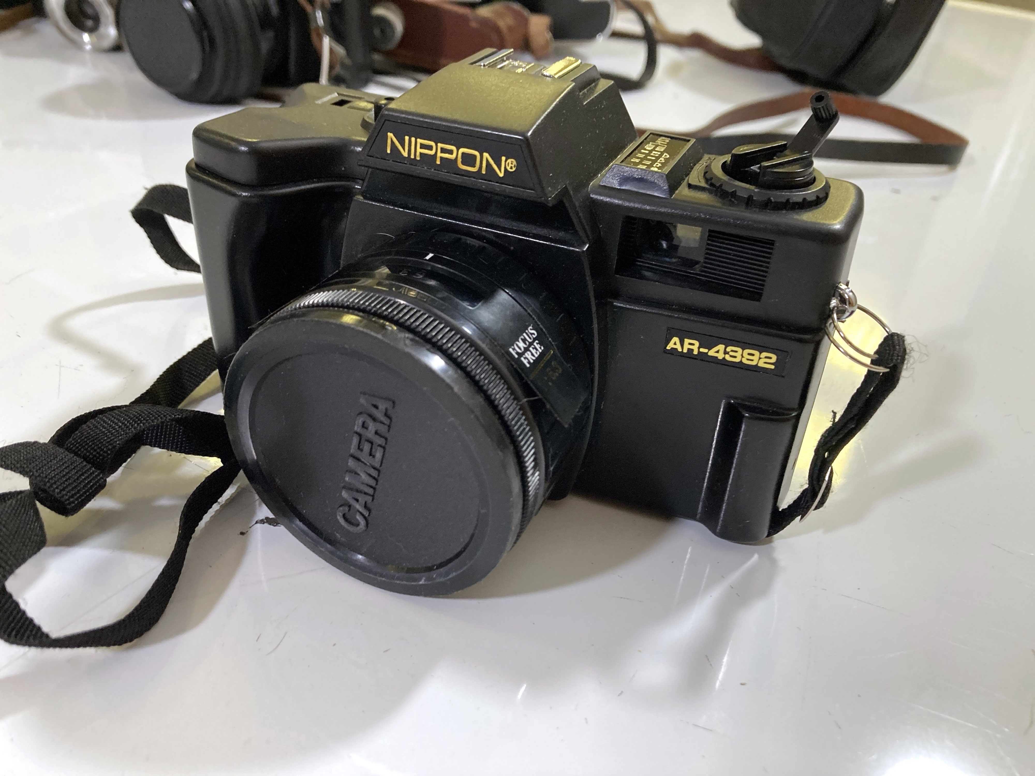 Lot 2 - CAMERAS AND LENSES.