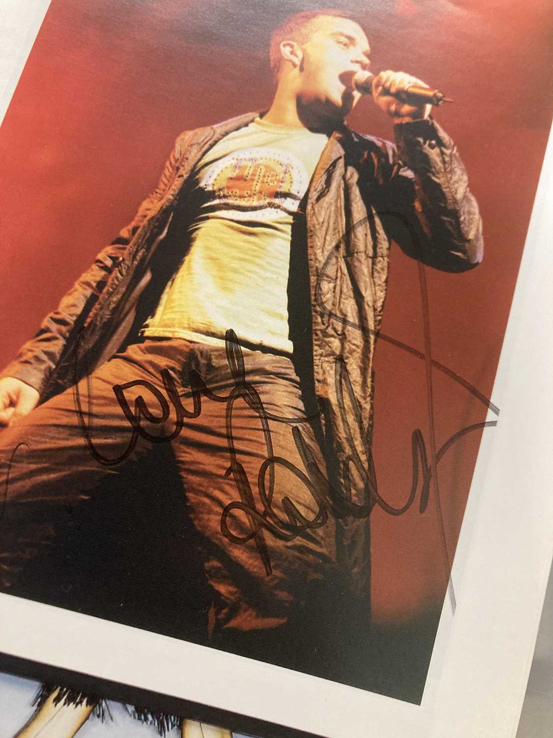 Lot 111 - POP PROGRAMMES INC ROBBIE WILLIAMS SIGNED.