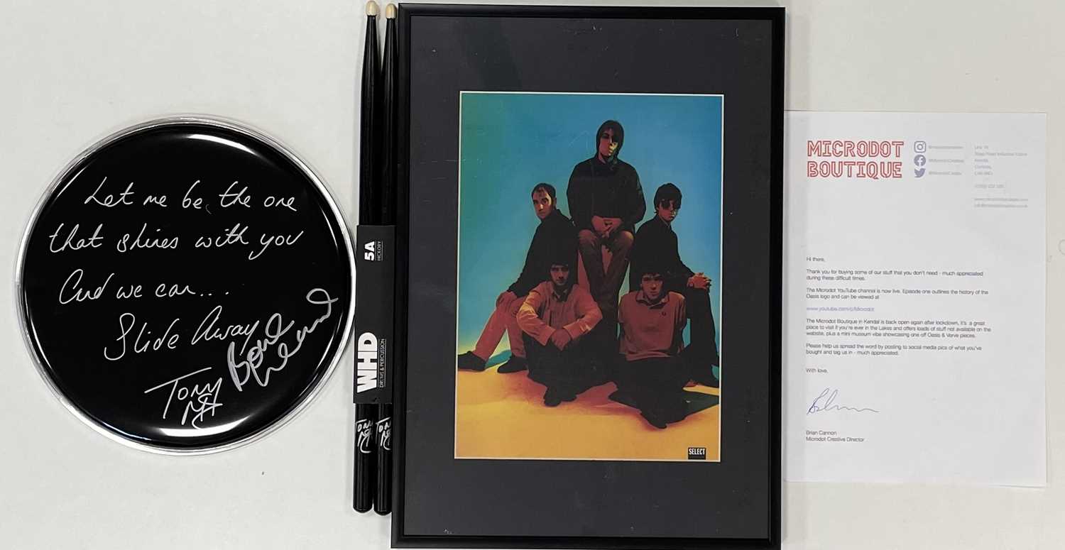 Lot 485 - OASIS - SIGNED DRUMSKIN AND DRUMSTICKS