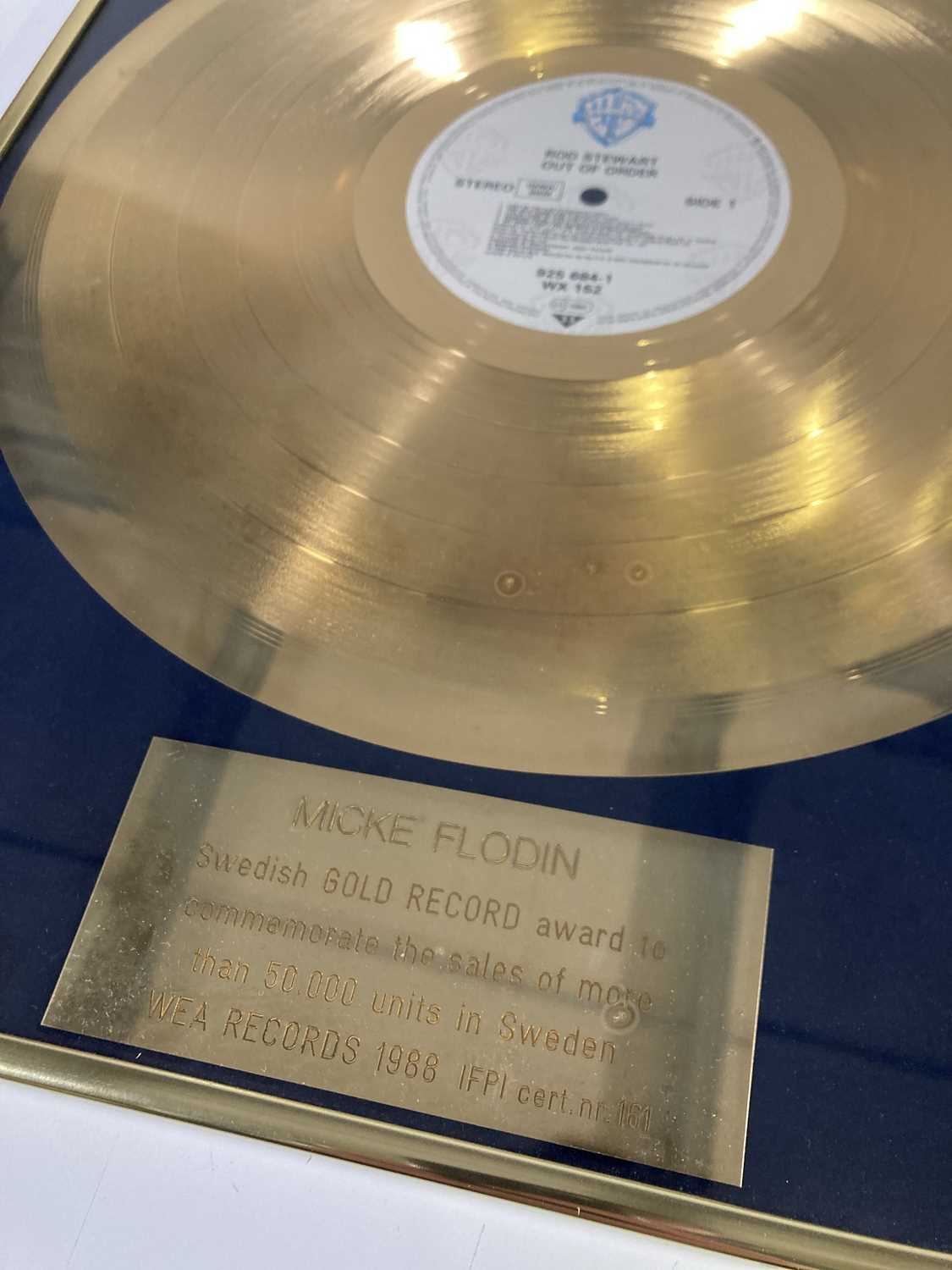 Lot 367 - ROD STEWART - A SWEDISH GOLD DISC FOR 'OUT