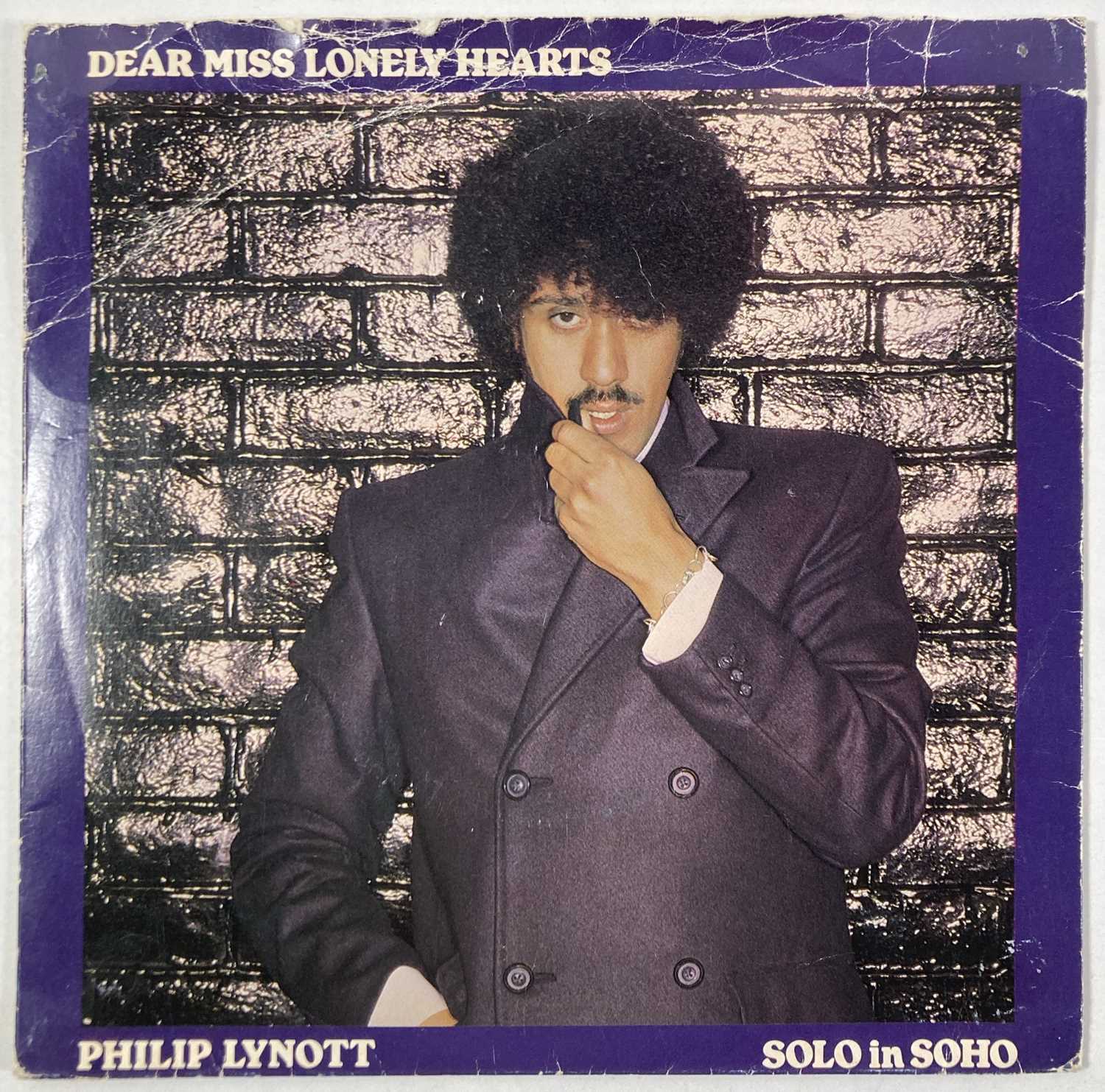 Lot 302 - THIN LIZZY - A 7" SINGLE SIGNED BY PHIL