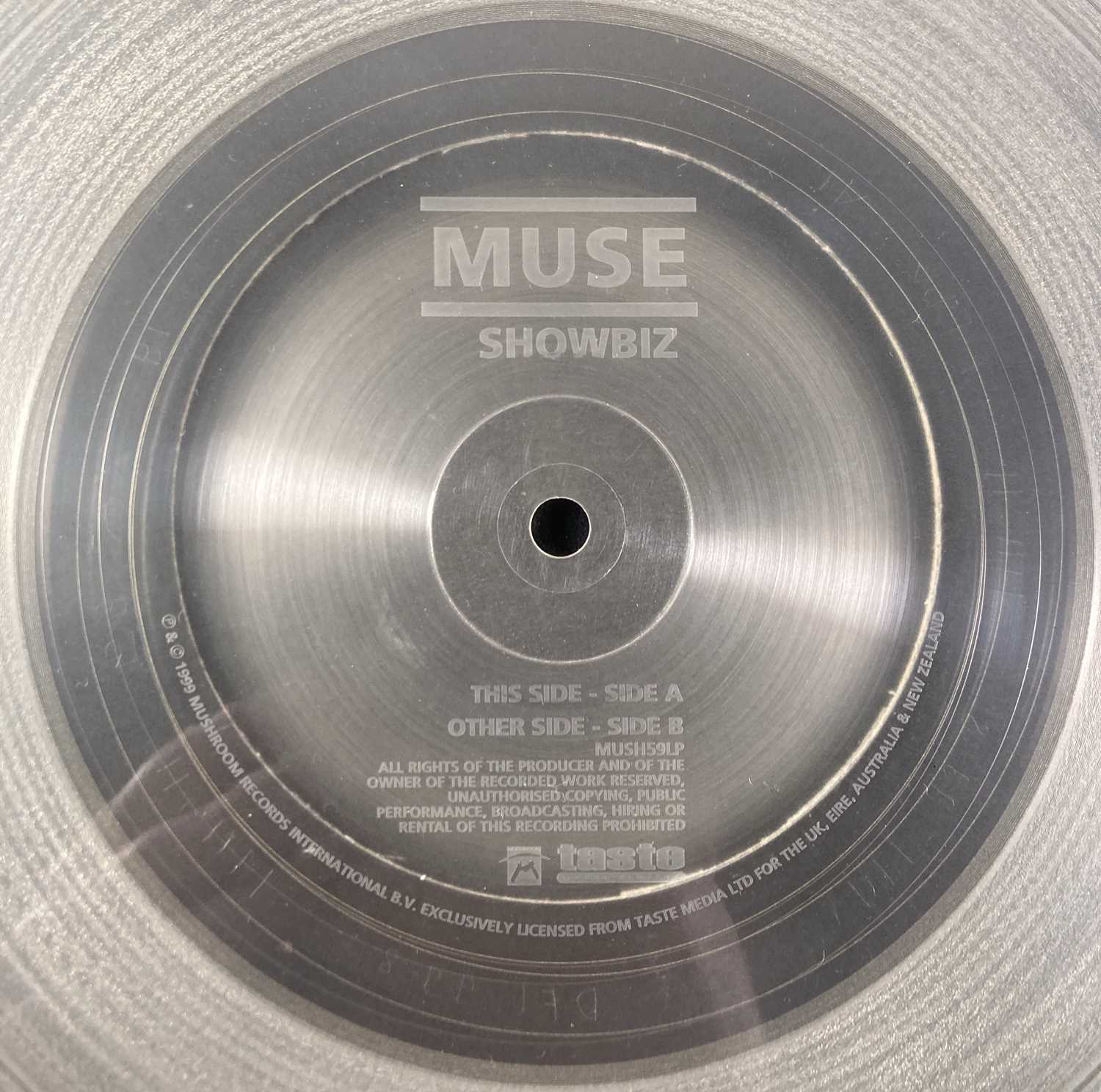 Lot 156 - MUSE - SHOWBIZ LP (1999 UK CLEAR VINYL