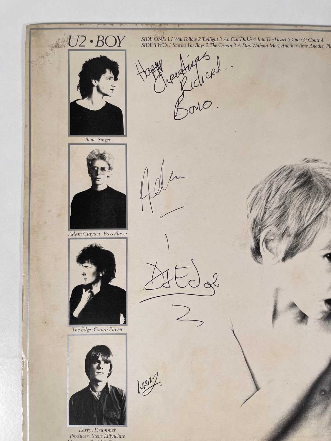 Lot 323 - U2 - SIGNED 'BOY' LP SLEEVE.