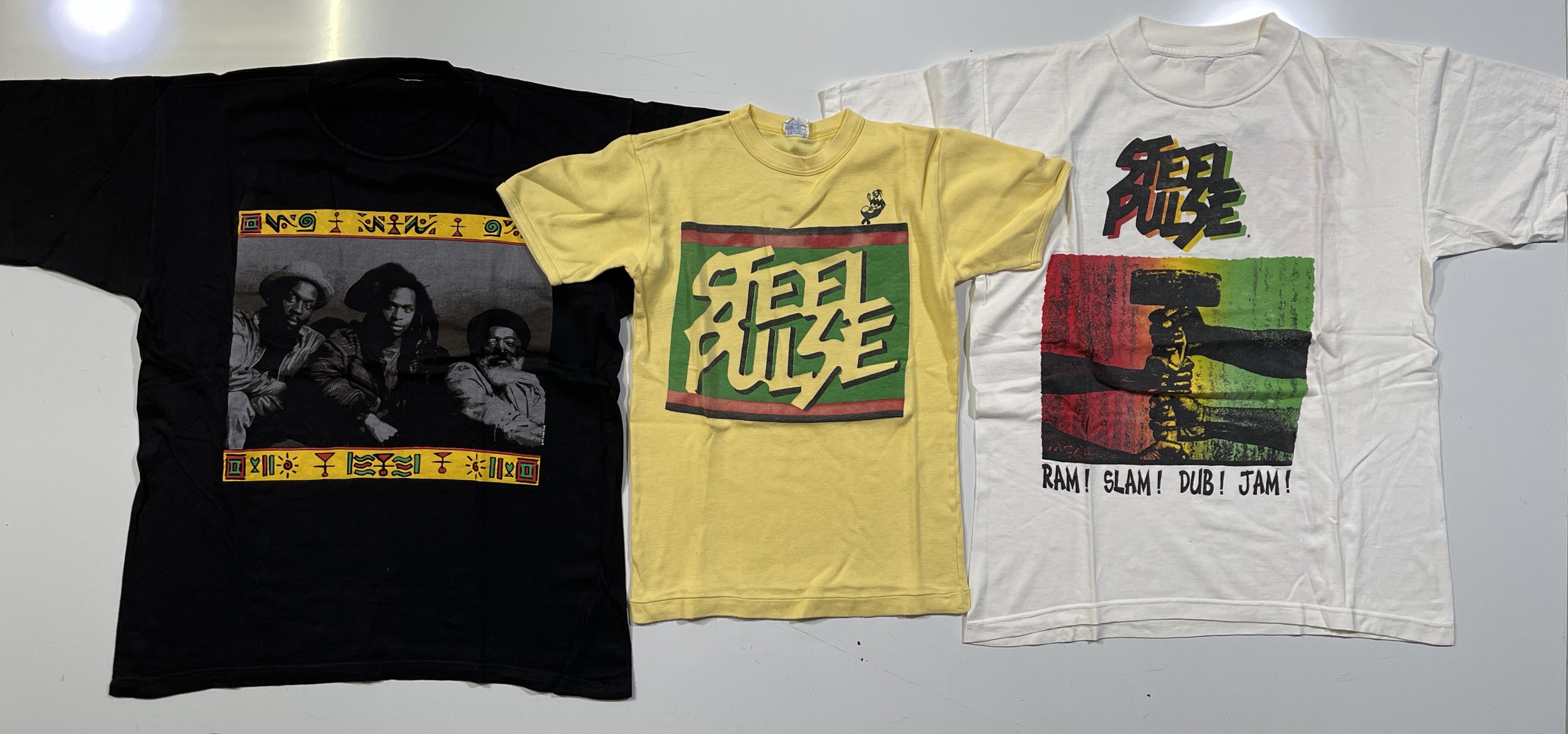 Lot 365 - THREE CIRCA 1980S STEEL PULSE TOUR T-SHIRTS.