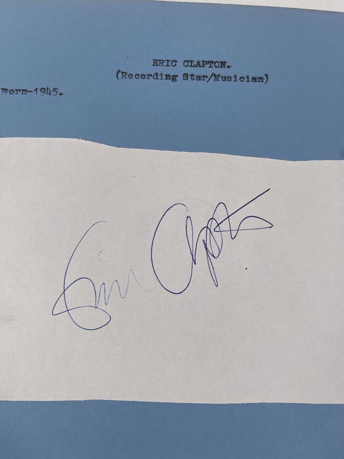 Lot 395 - ERIC CLAPTON - SIGNED PAGE.