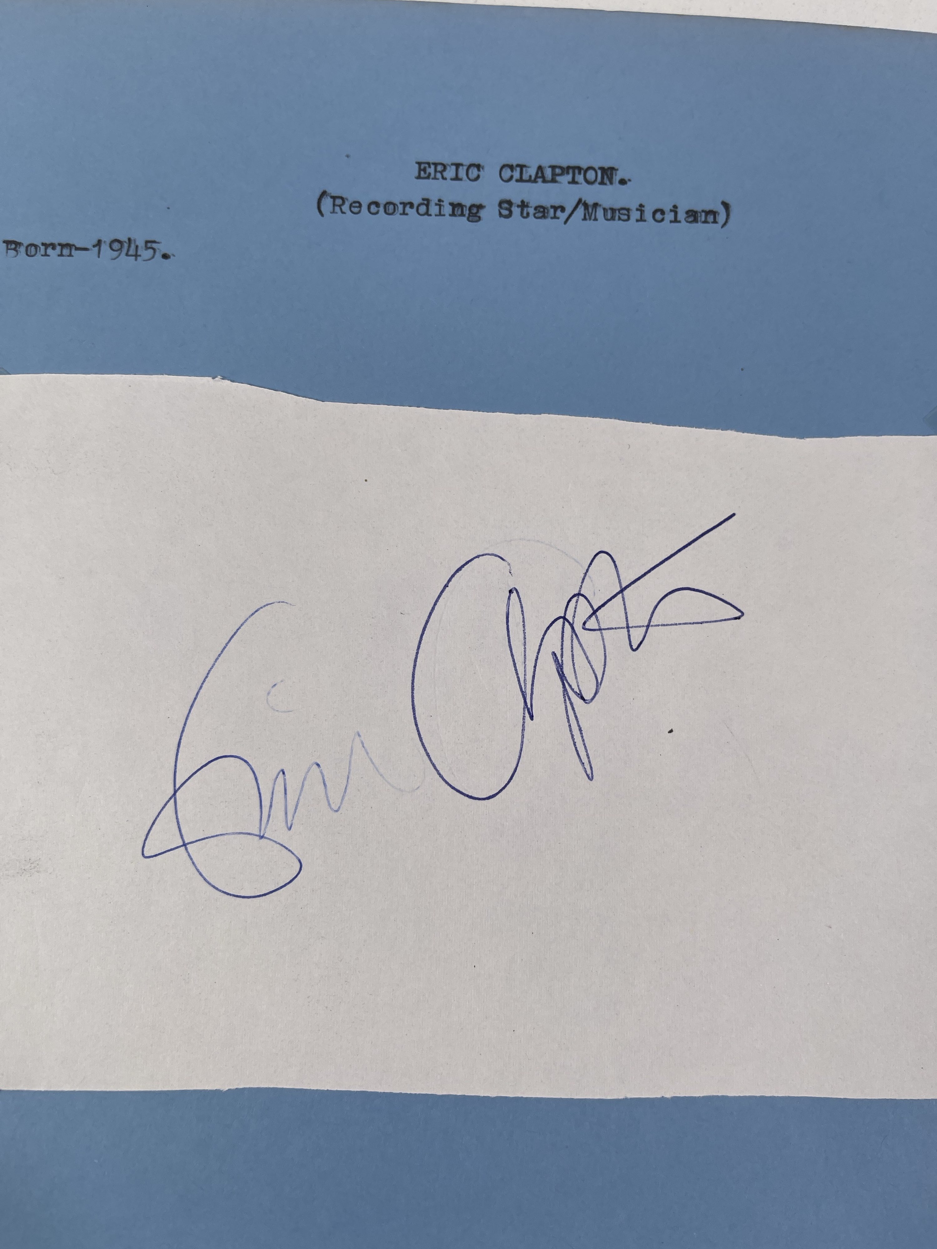 Lot 395 - ERIC CLAPTON - SIGNED PAGE.