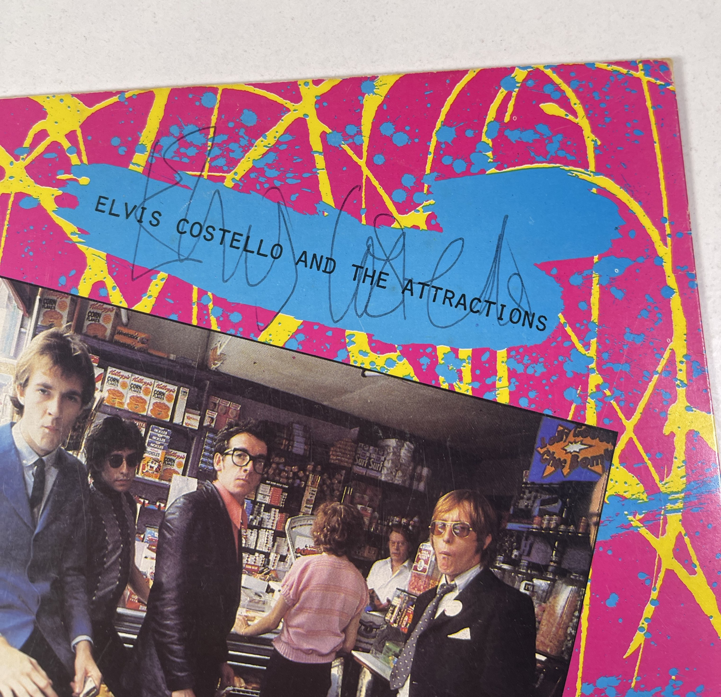 Lot 245 - ELVIS COSTELLO - SIGNED 7" SINGLE.