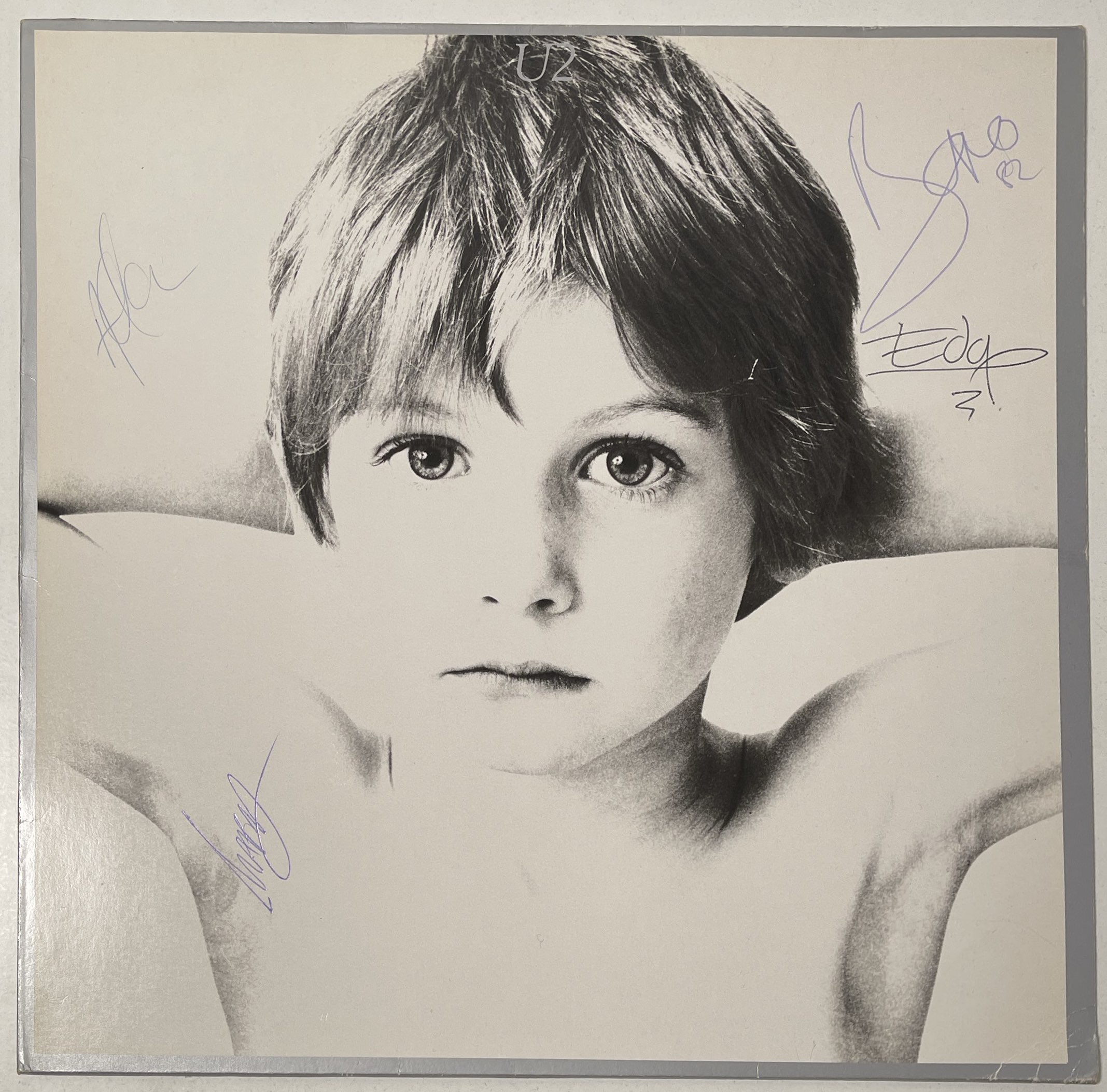Lot 94 - U2 - A FULLY SIGNED COPY OF BOY.