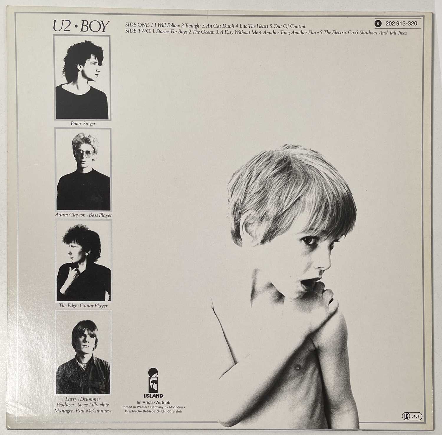 Lot 94 - U2 - A FULLY SIGNED COPY OF BOY.