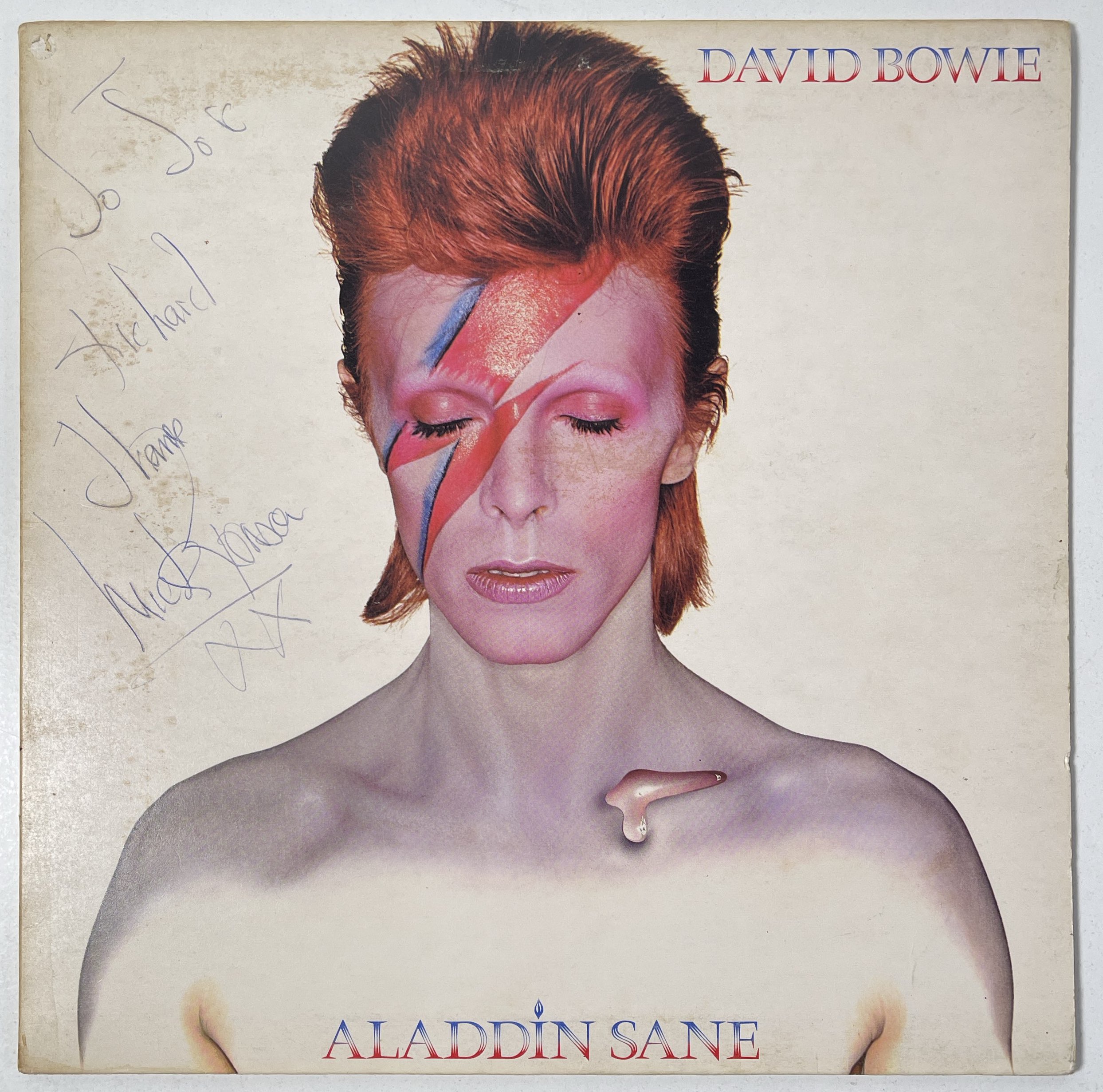 Lot 284 - DAVID BOWIE - A COPY OF ALADDIN SANE SIGNED