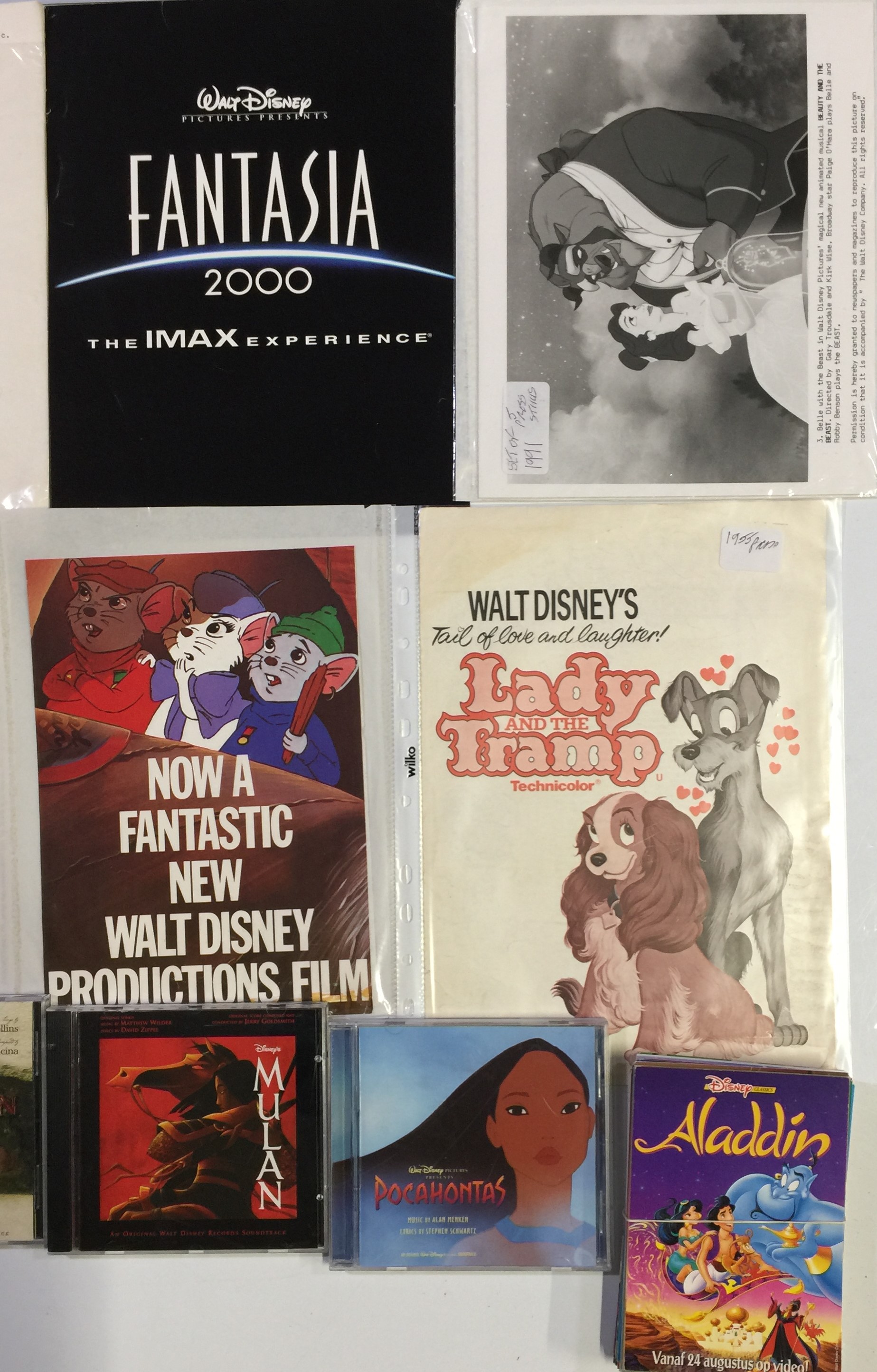 Lot 210 - WALT DISNEY - BROCHURES / LOBBY CARDS ETC.