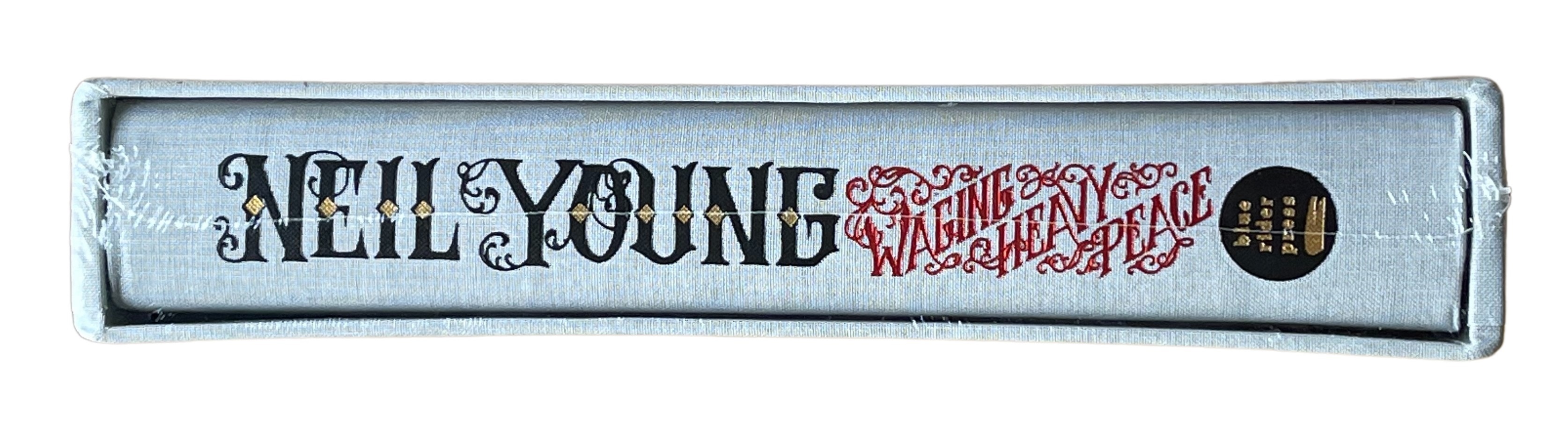 Lot 246 - NEIL YOUNG WAGING HEAVY PEACE SIGNED
