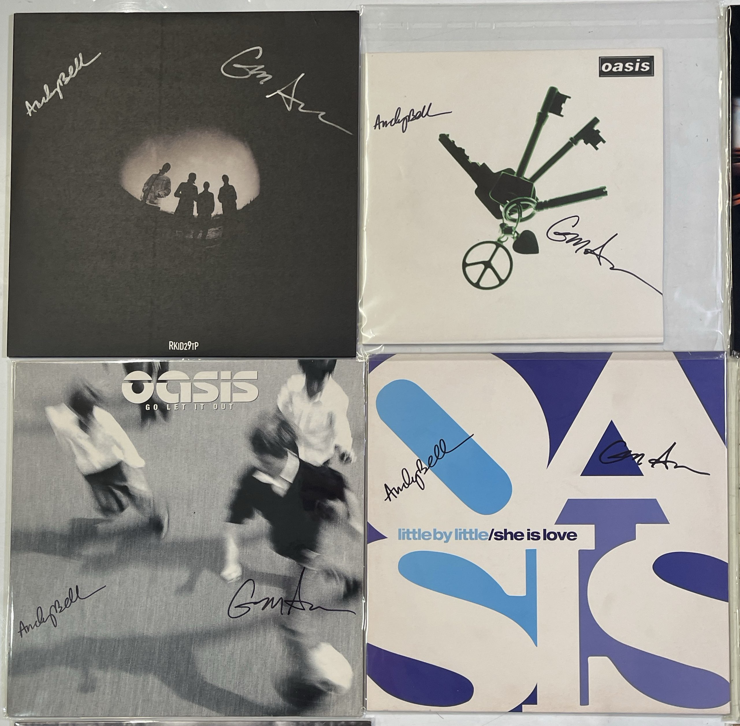 Lot 342 - OASIS - BAND MEMBER SIGNED RECORDS.