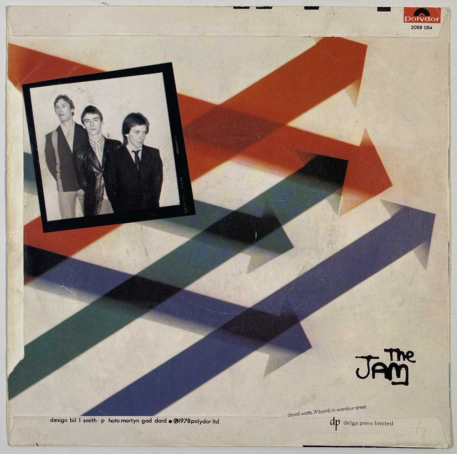 Lot 501 - THE JAM - FULLY SIGNED COPY OF 'A BOMB IN