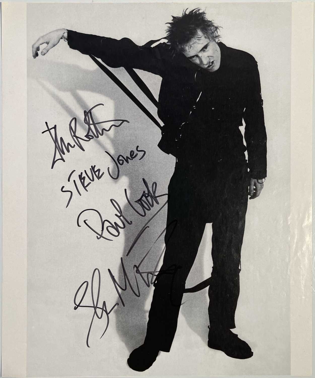 Lot 562 The Sex Pistols Large Fully Signed Image