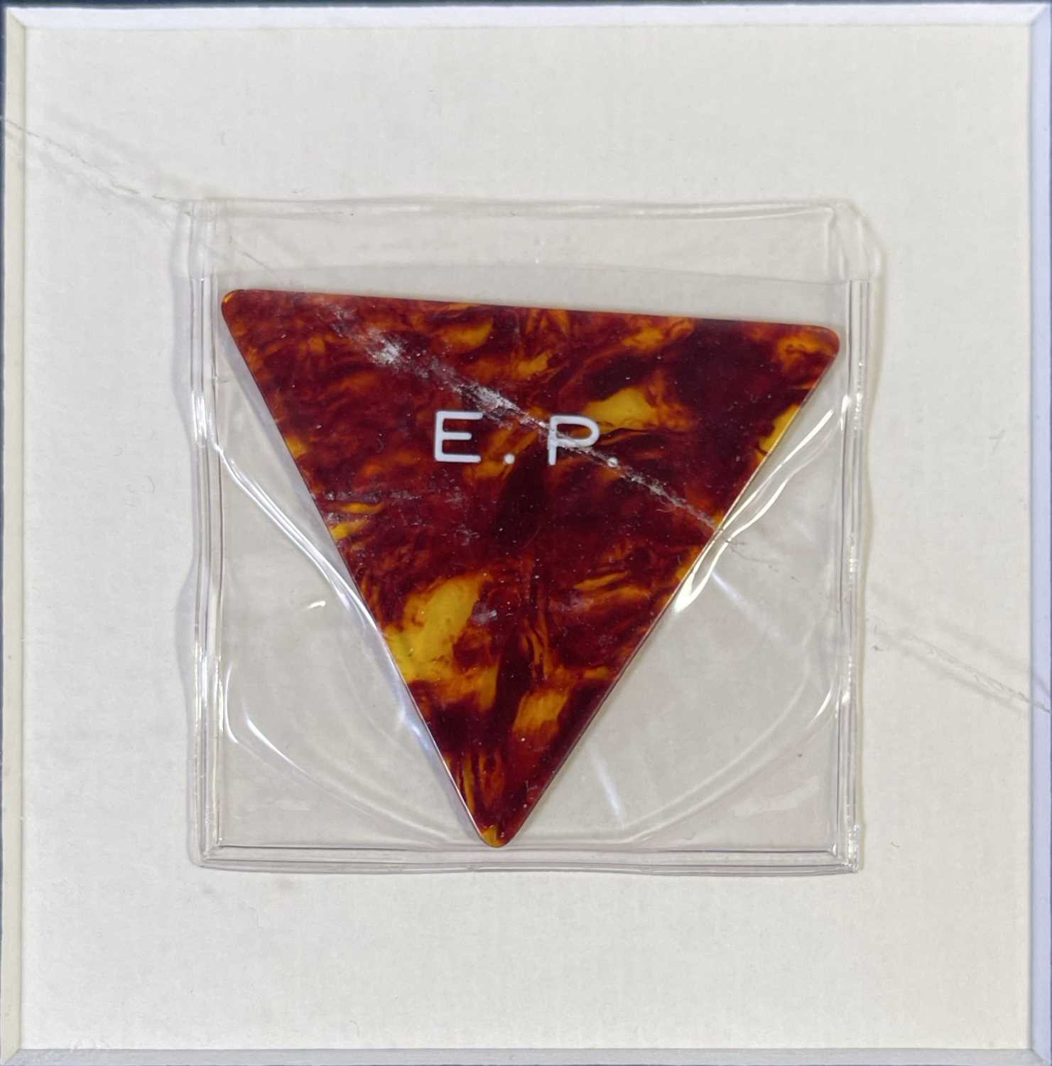 Lot 340 - ELVIS PRESLEY OWNED AND USED GUITAR PICK.