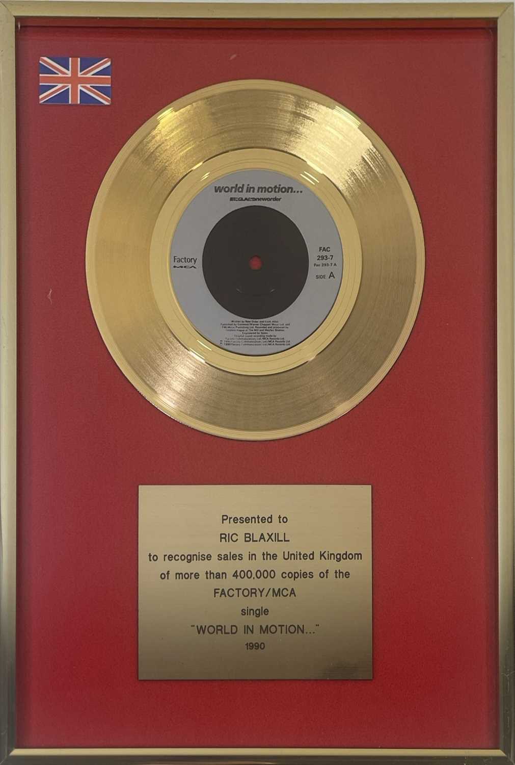Lot 478 - NEW ORDER - OFFICIAL GOLD DISC FOR 'WORLD IN