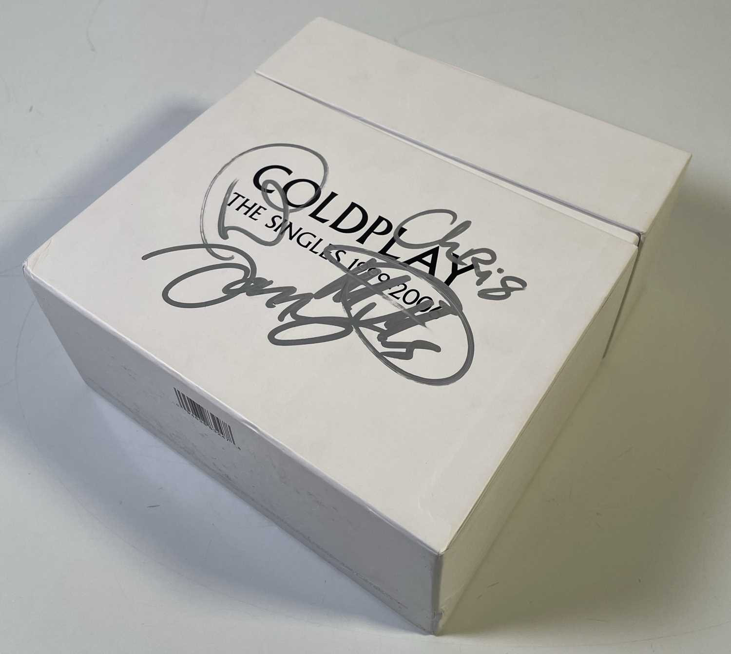 Lot 289 - COLDPLAY - FULLY SIGNED SINGLES BOX WITH 14
